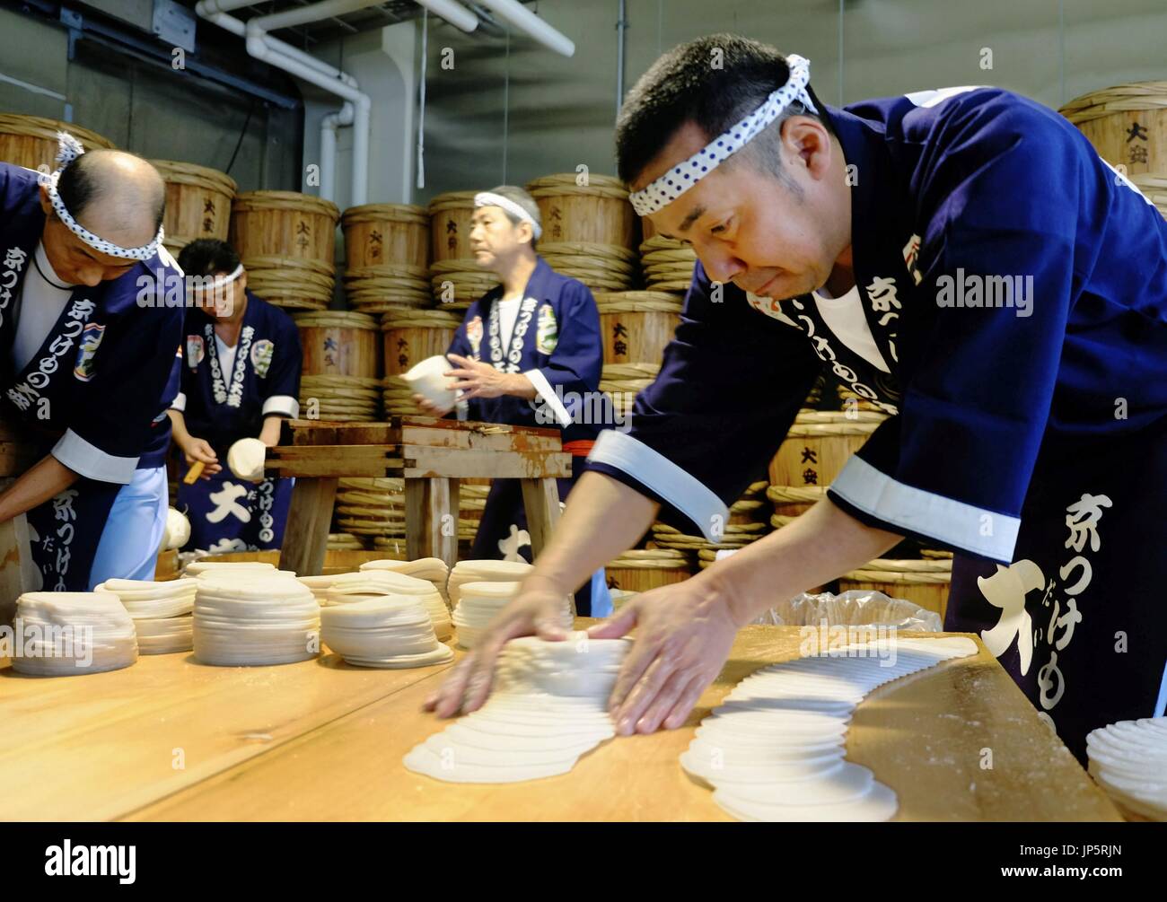 KYOTO, Japan - "Happi" jacket-clad workers at Daiyasu, a time-honored ...