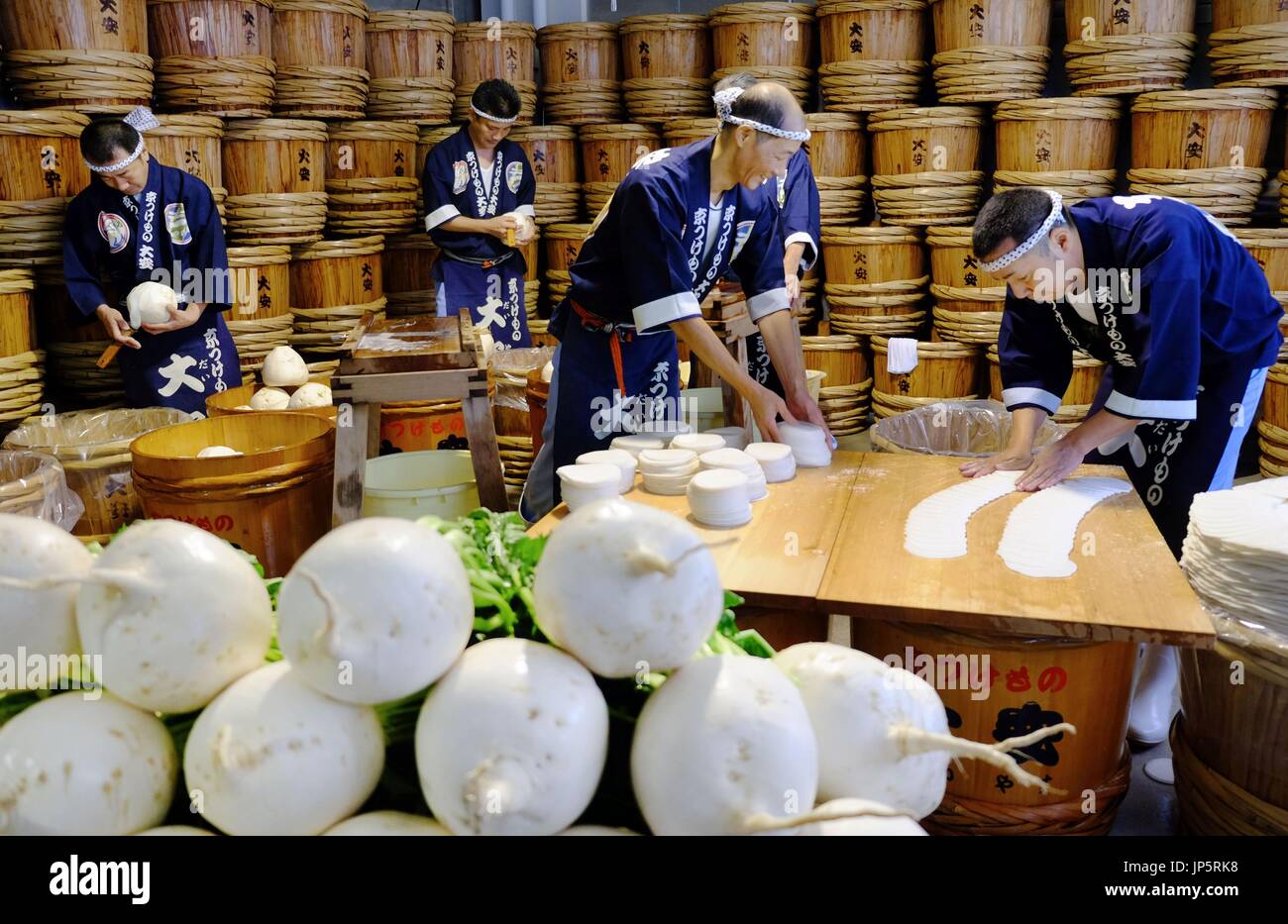 KYOTO, Japan - "Happi" jacket-clad workers at Daiyasu, a time-honored ...
