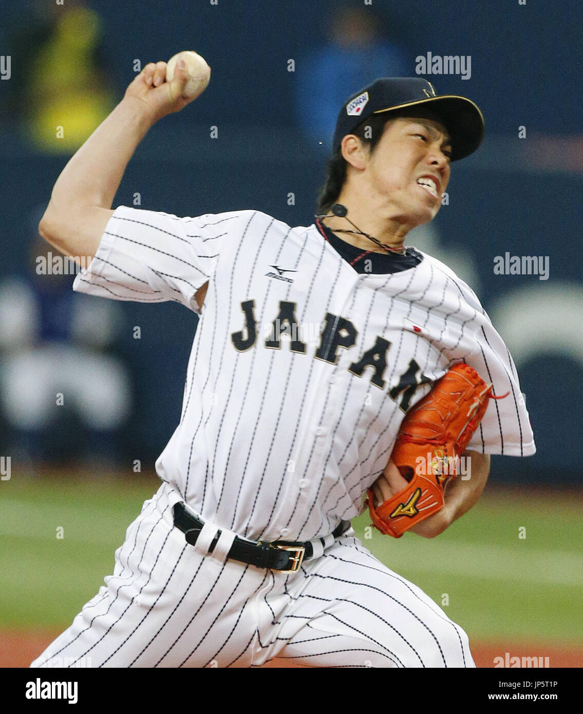 TOKYO, Japan - Hiroshima Carp ace Kenta Maeda throws a pitch at Kyocera ...