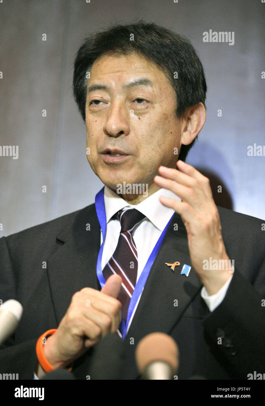 BEIJING, China - Japanese health minister Yasuhisa Shiozaki speaks to ...