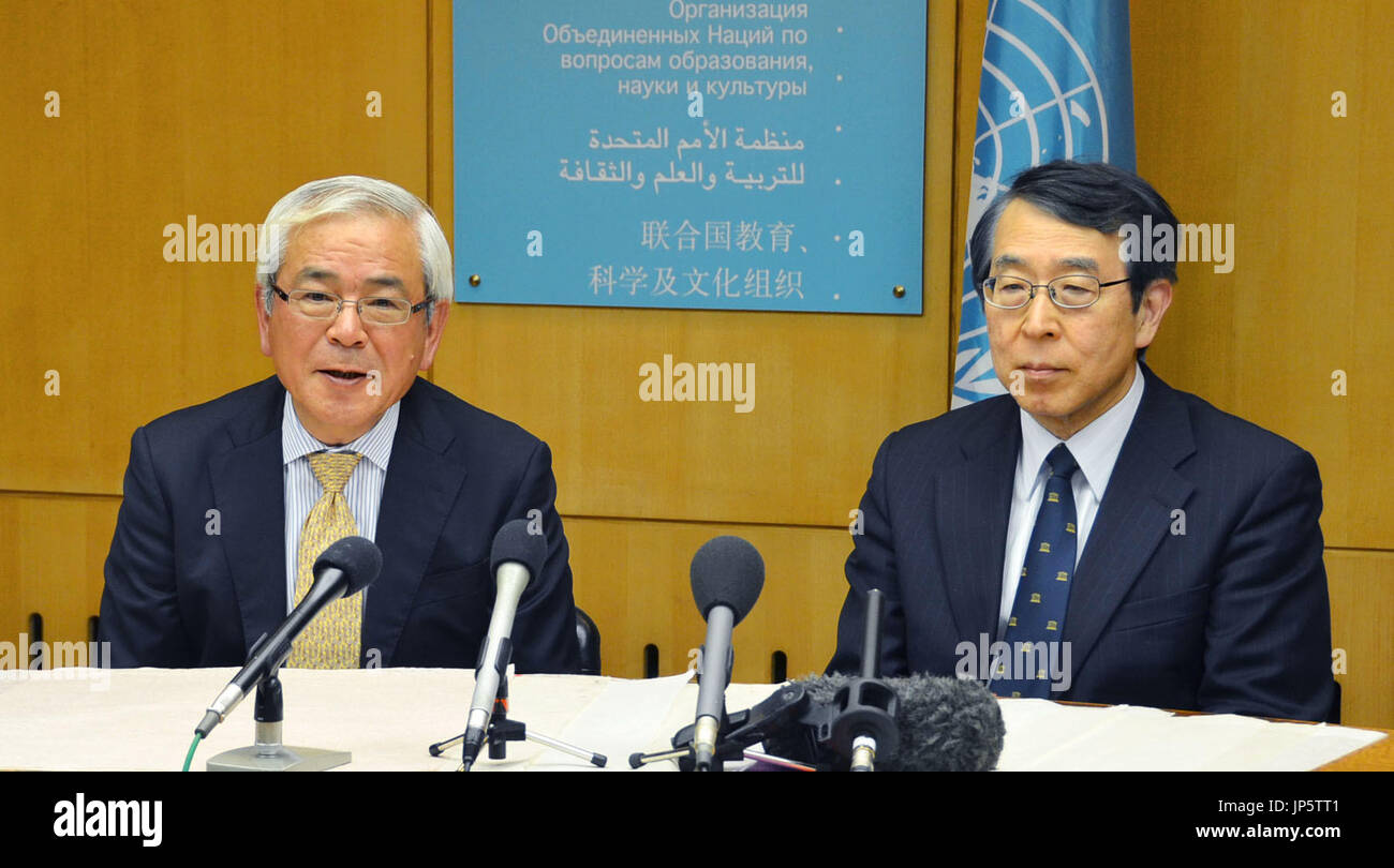 PARIS, France - Japanese Cultural Agency chief Masanori Aoyagi (L) and ...