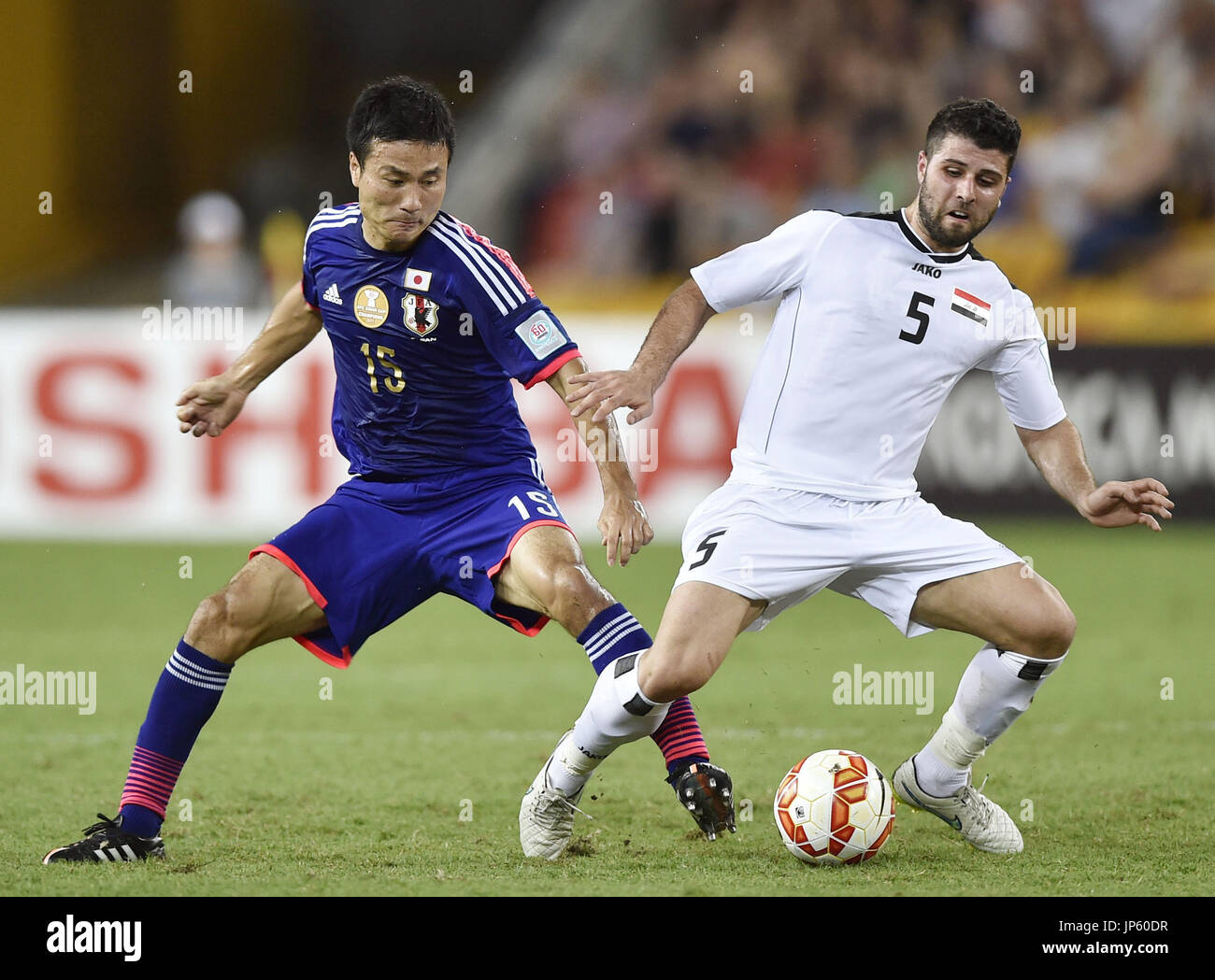 BRISBANE, Australia - Japan's Yasuyuki Konno (L) and Iraq's Yaser Safa ...