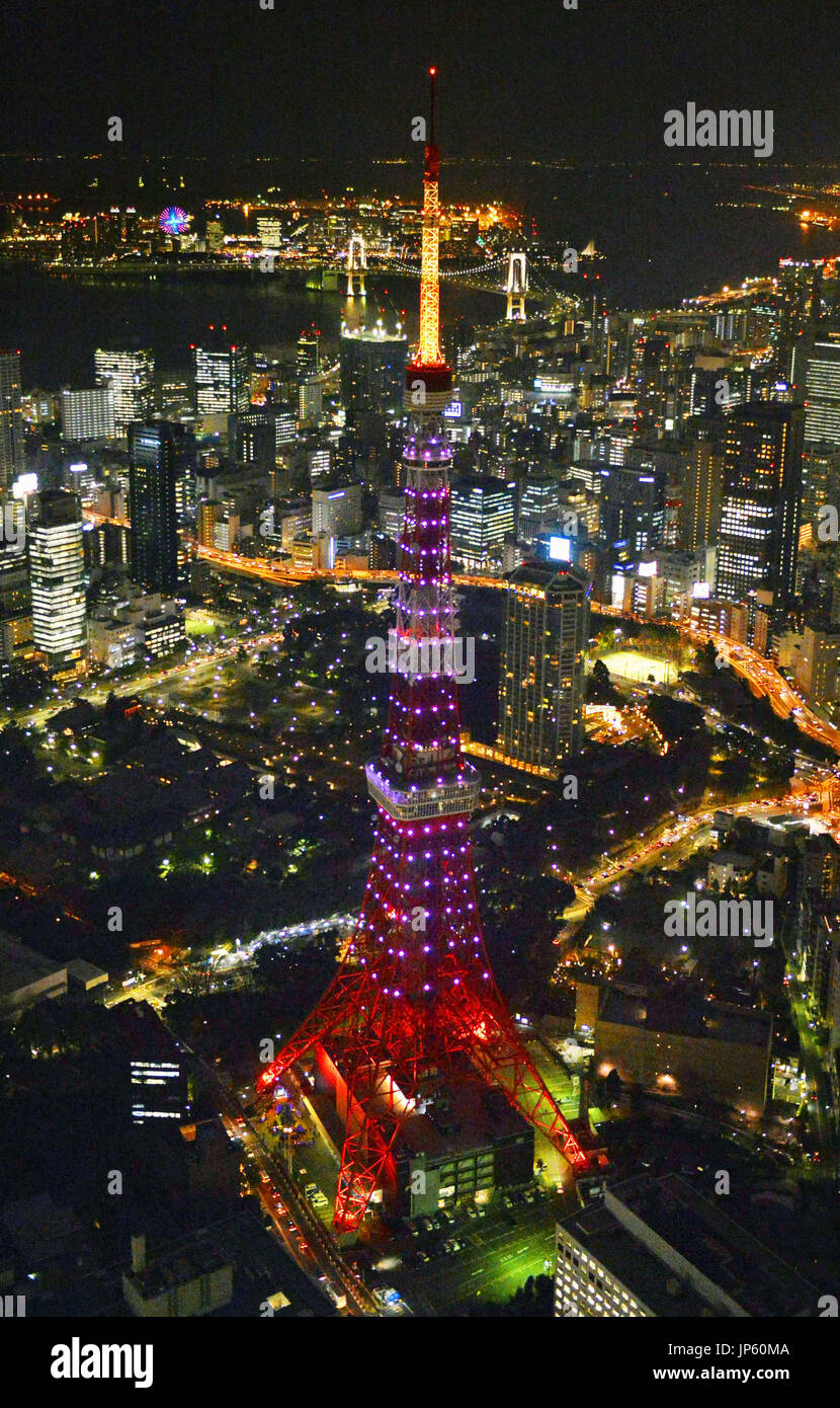 TOKYO, Japan - Tokyo Tower is illuminated in cherry color in the ...