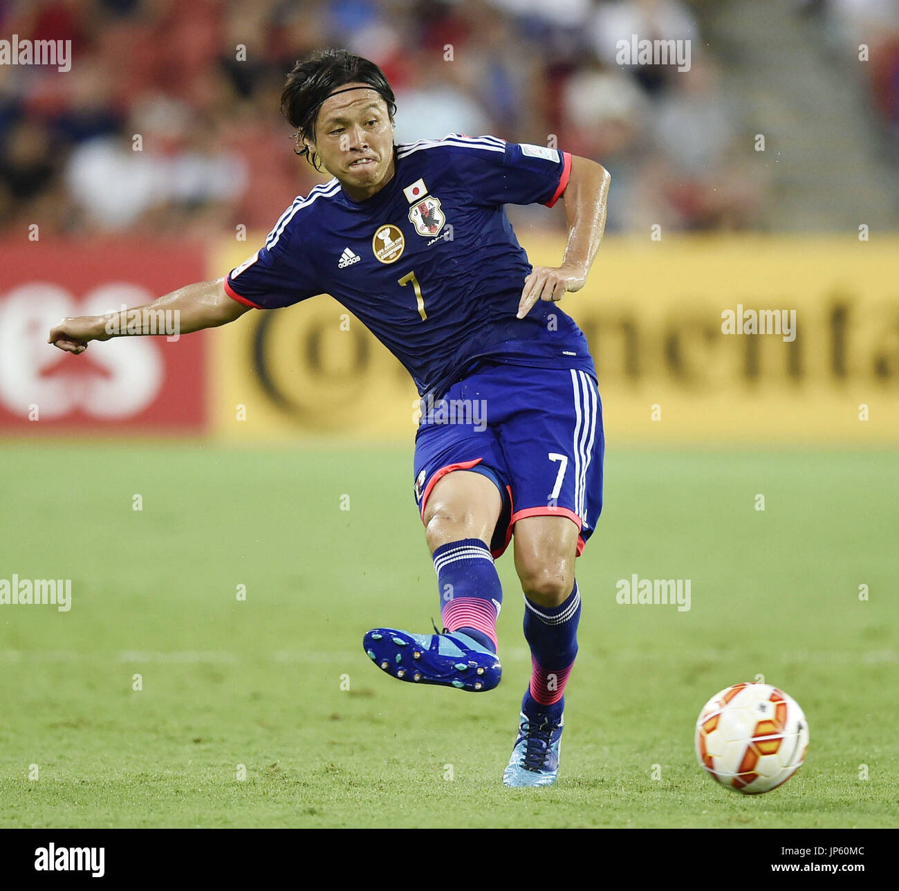 BRISBANE, Australia - Midfielder Yasuhito Endo of Japan makes a pass en ...