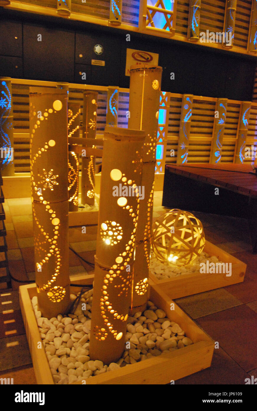 Bamboo cylinders with variously shaped holes illuminate Tokyo's ...