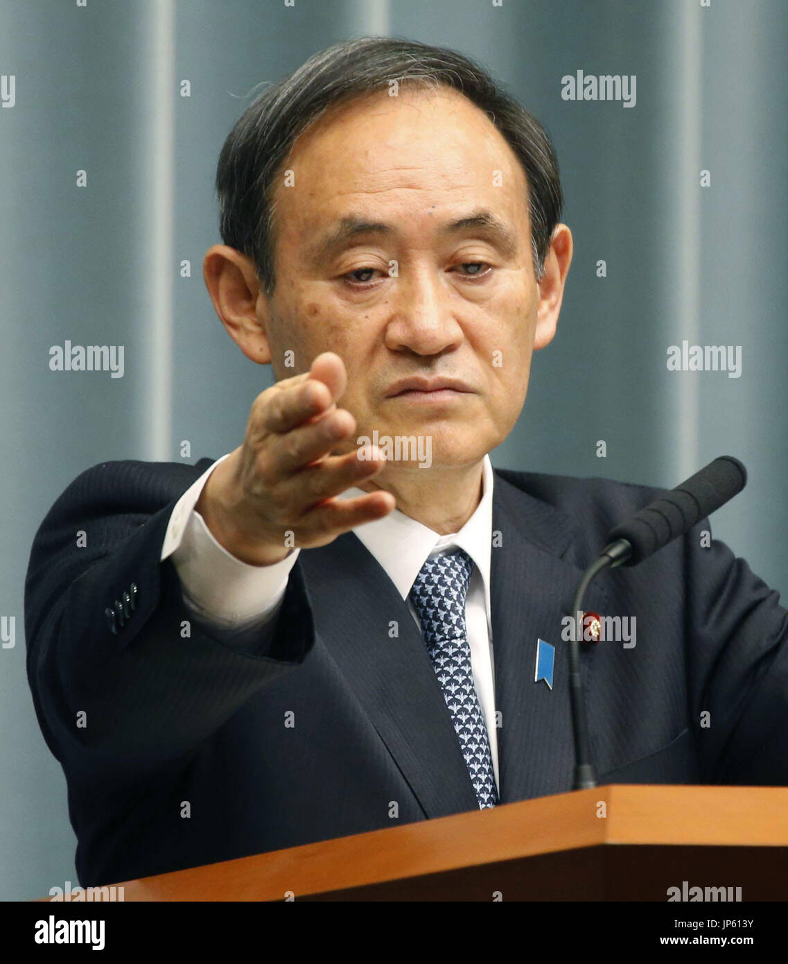Chief Cabinet Secretary Yoshihide Suga attends a press conference on ...