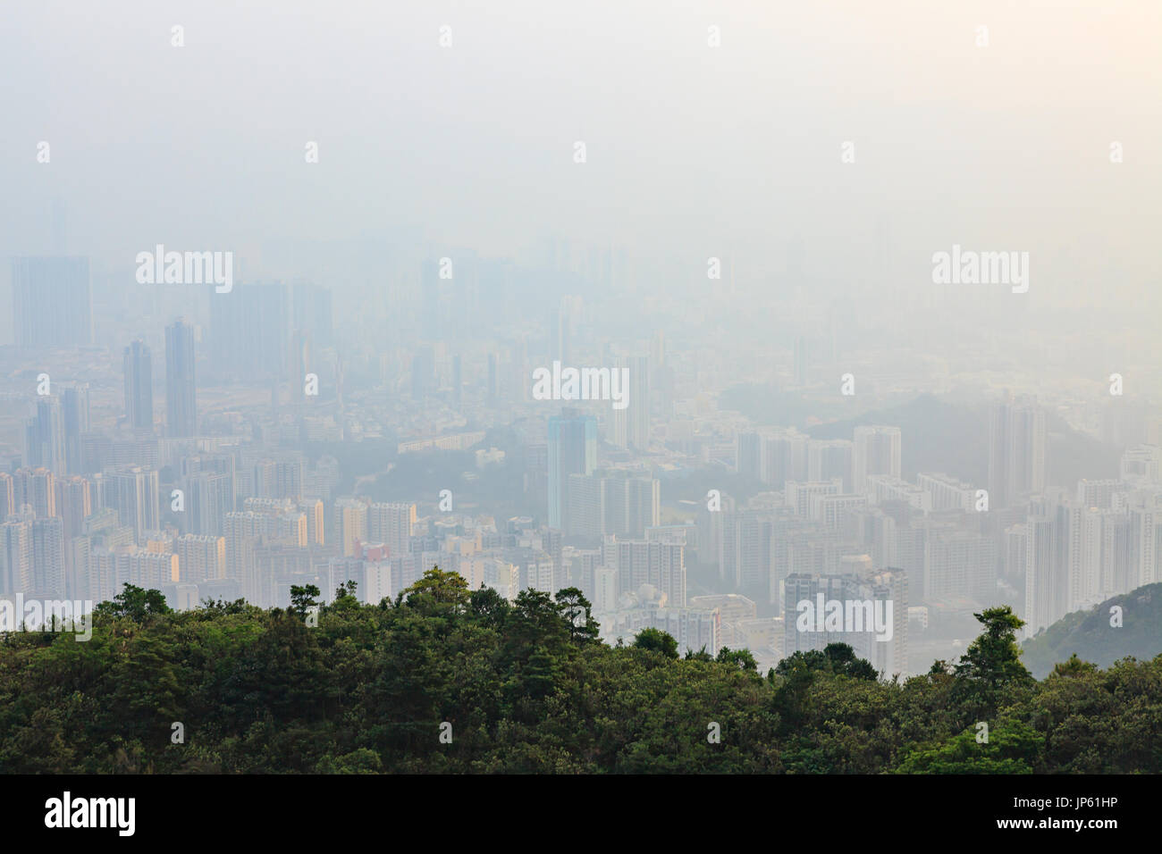 Hong kong tall buildings in haze Stock Photo - Alamy
