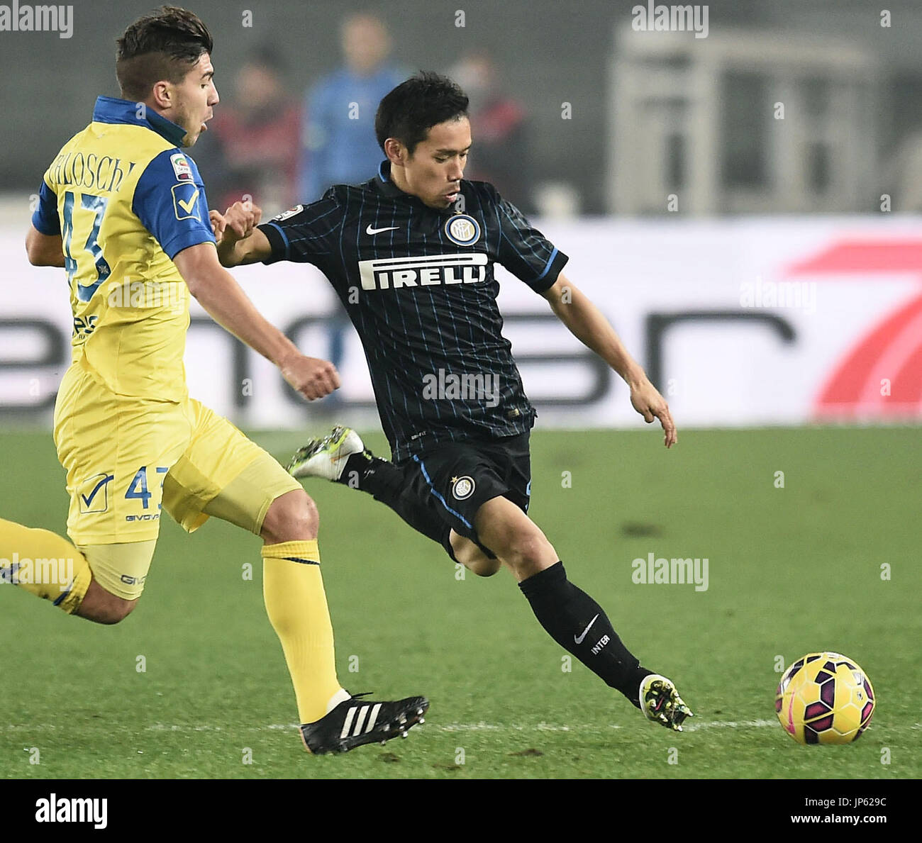 VERONA, Italy - Japanese footballer Yuto Nagatomo (R) of Inter Milan ...