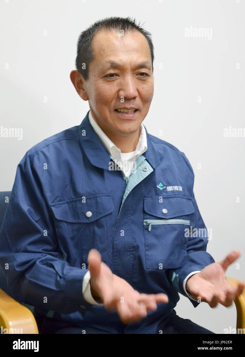 TOKYO, Japan - Koji Nitta, an Environment Ministry official, speaks ...