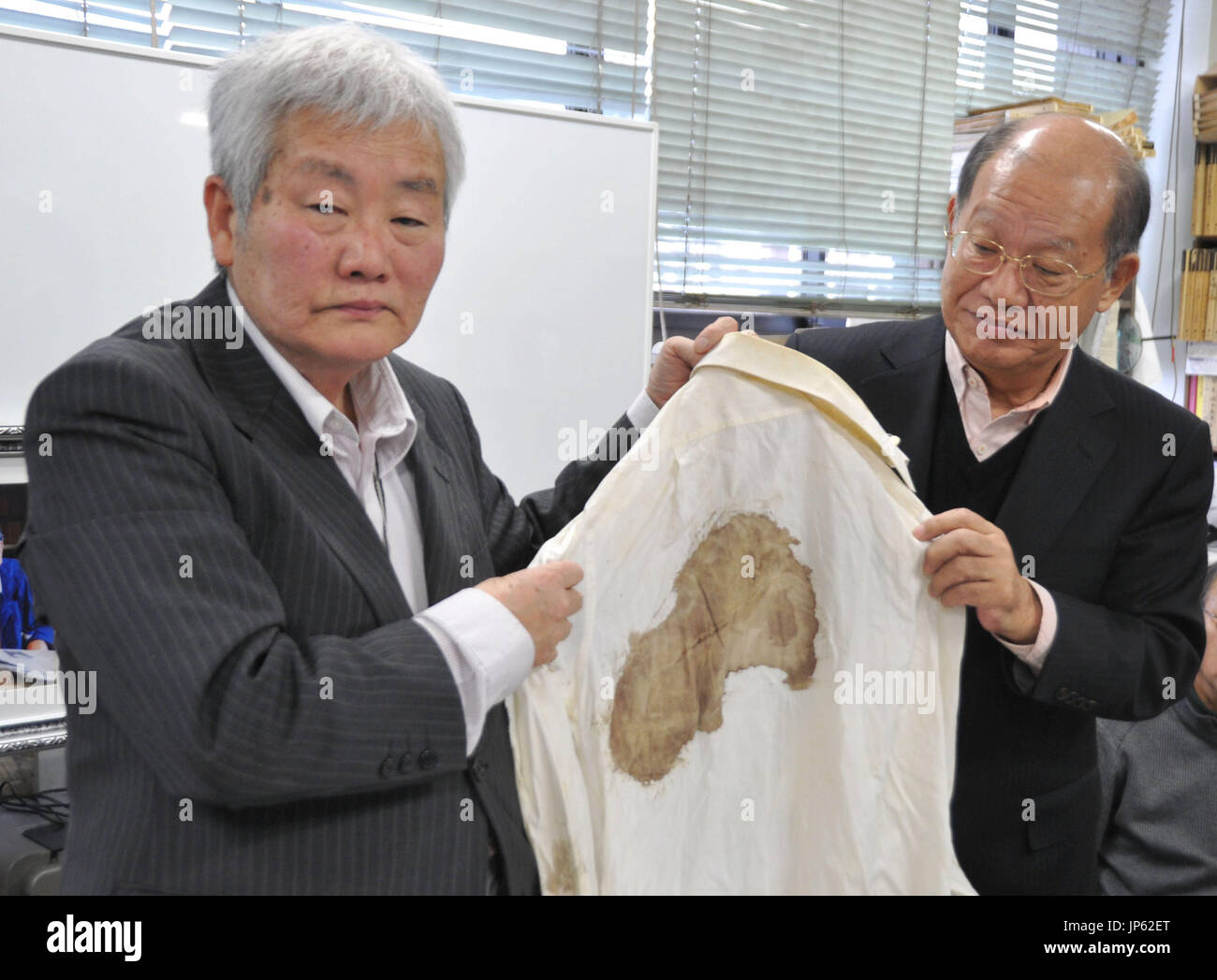 NAGASAKI, Japan - A bloodstained shirt worn in 1990 by then Nagasaki ...