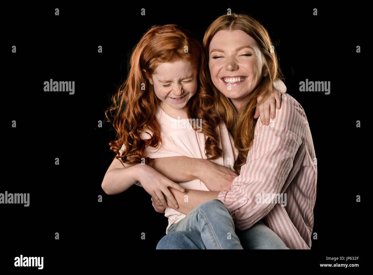 Beautiful Redhead Mother And Daughter Having Fun Together Isolated On