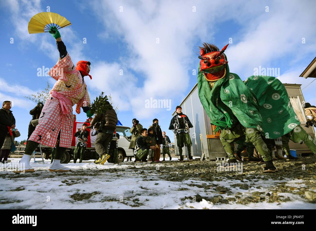 HIGASHIMATSUSHIMA, Japan - A "shishi-mai" lion dance is performed at ...