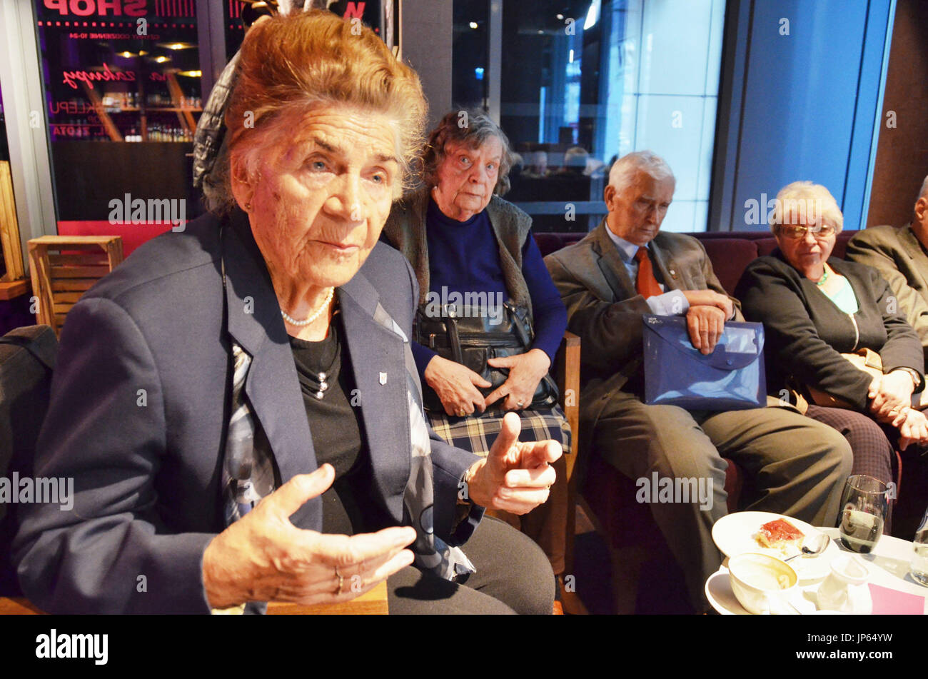 A female member of a group formed by 25 Polish people who survived the ...