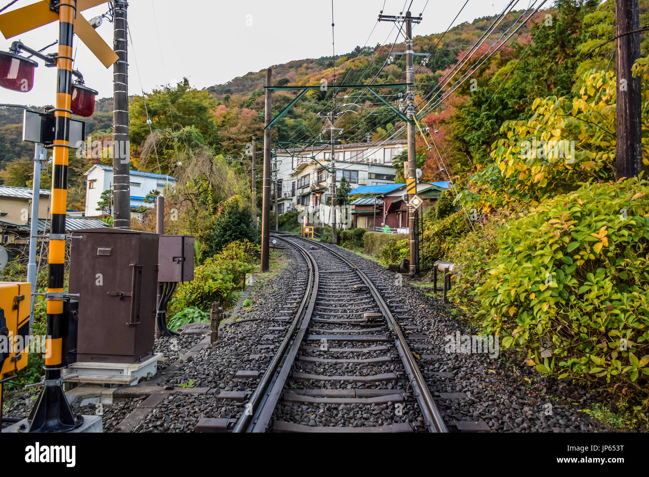 Countryside train track (railway) cross the city of Hakone in Japan ...