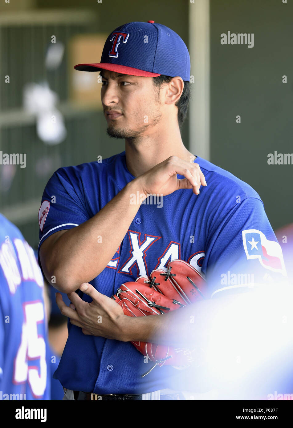 Texas Rangers pitcher Yu Darvish touches his right arm after leaving ...