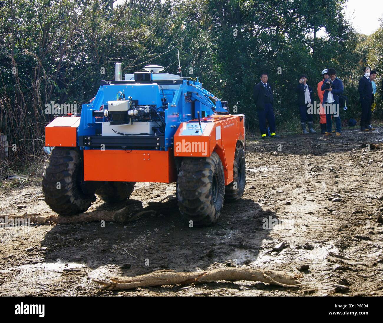 An unmanned amphibious probe connected with wearable sensors undergoes ...