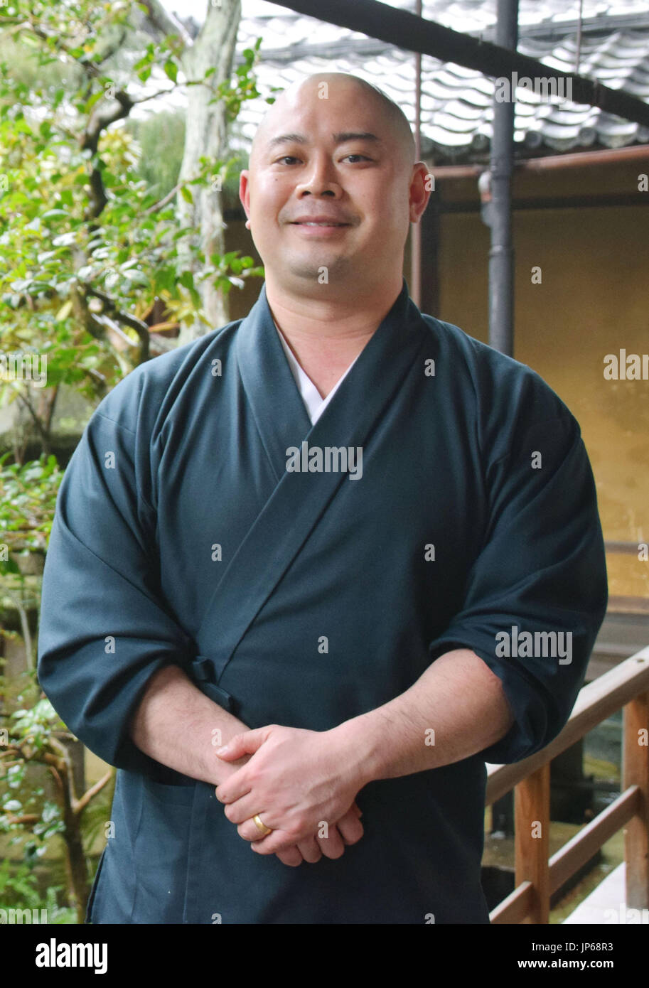 Zenryu Kawakami, deputy master of Shunkoin Bhuddist temple in Kyoto, western Japan, poses in ...