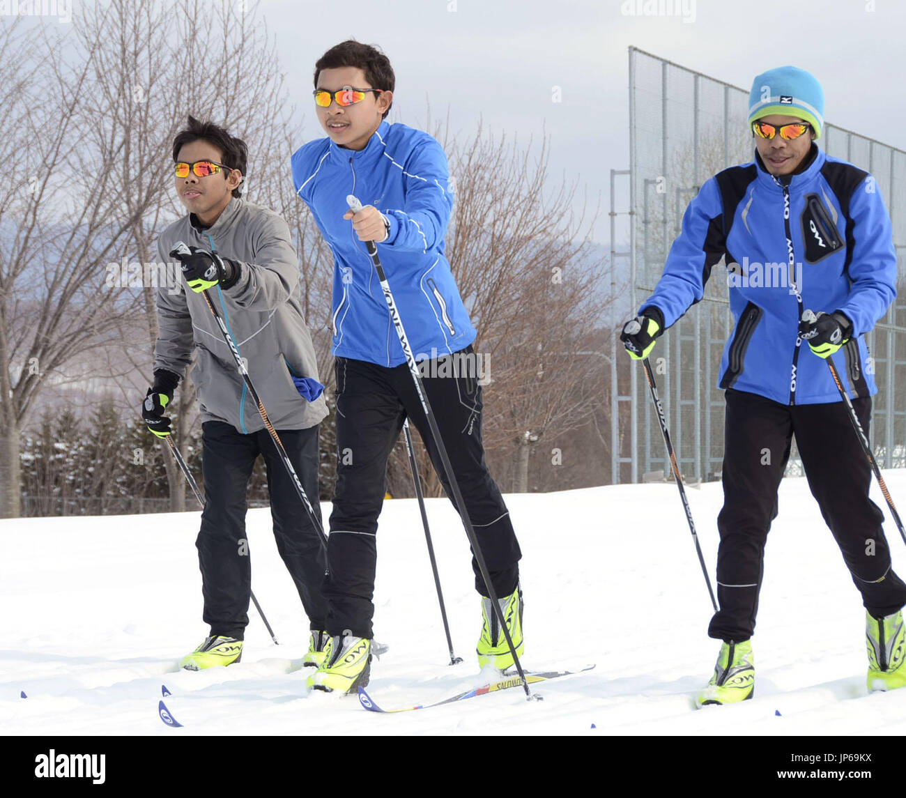 Three young Thais practice cross-country skiing in Higashikawa ...