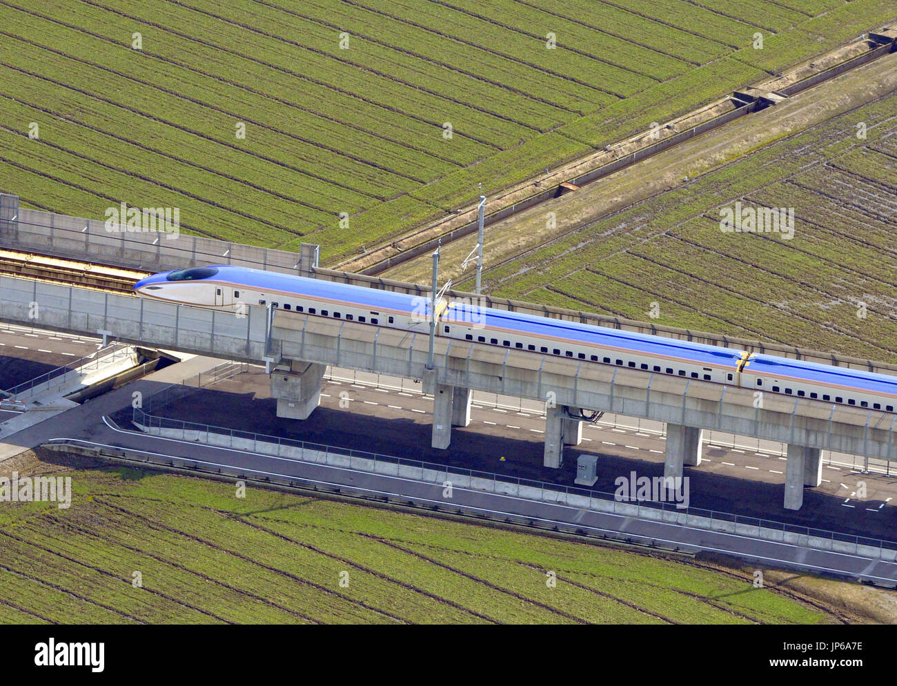 Photo taken from a Kyodo News helicopter shows a bullet train on the ...