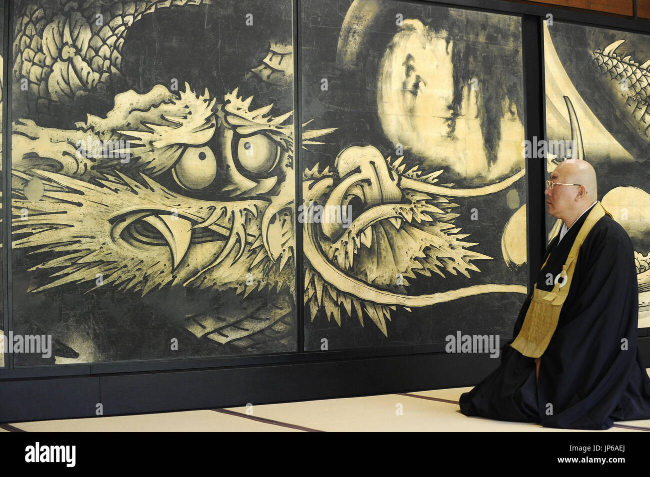 A monk observes a digitally produced replica of the dramatic, eight ...