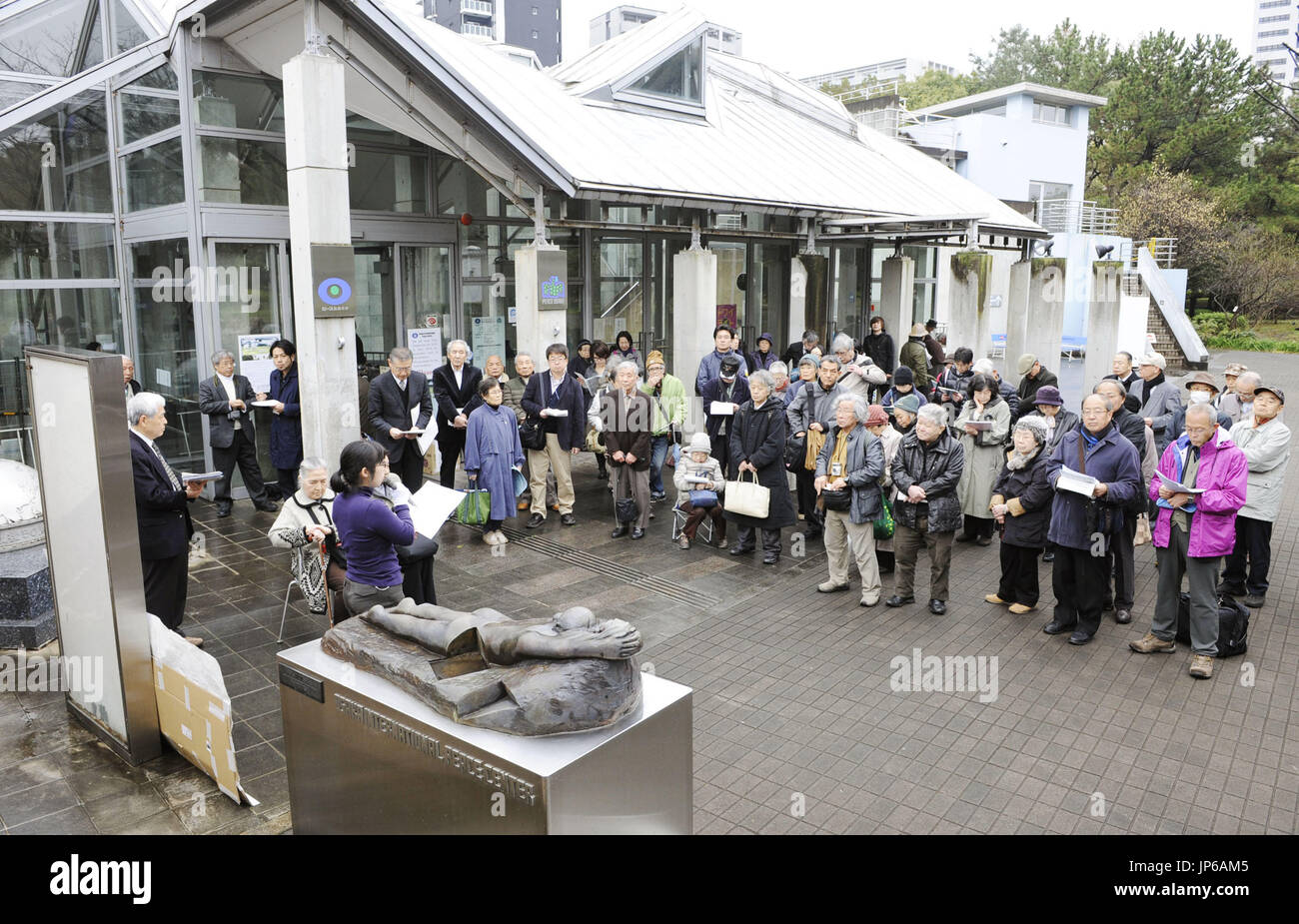 People gather at the Osaka International Peace Center in Osaka on March ...