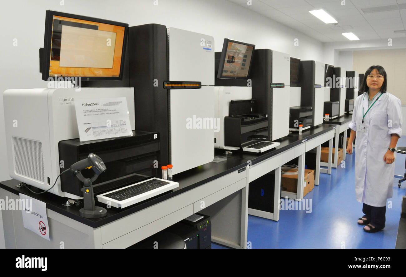 Machines for analyzing genetic information are seen at a laboratory of ...
