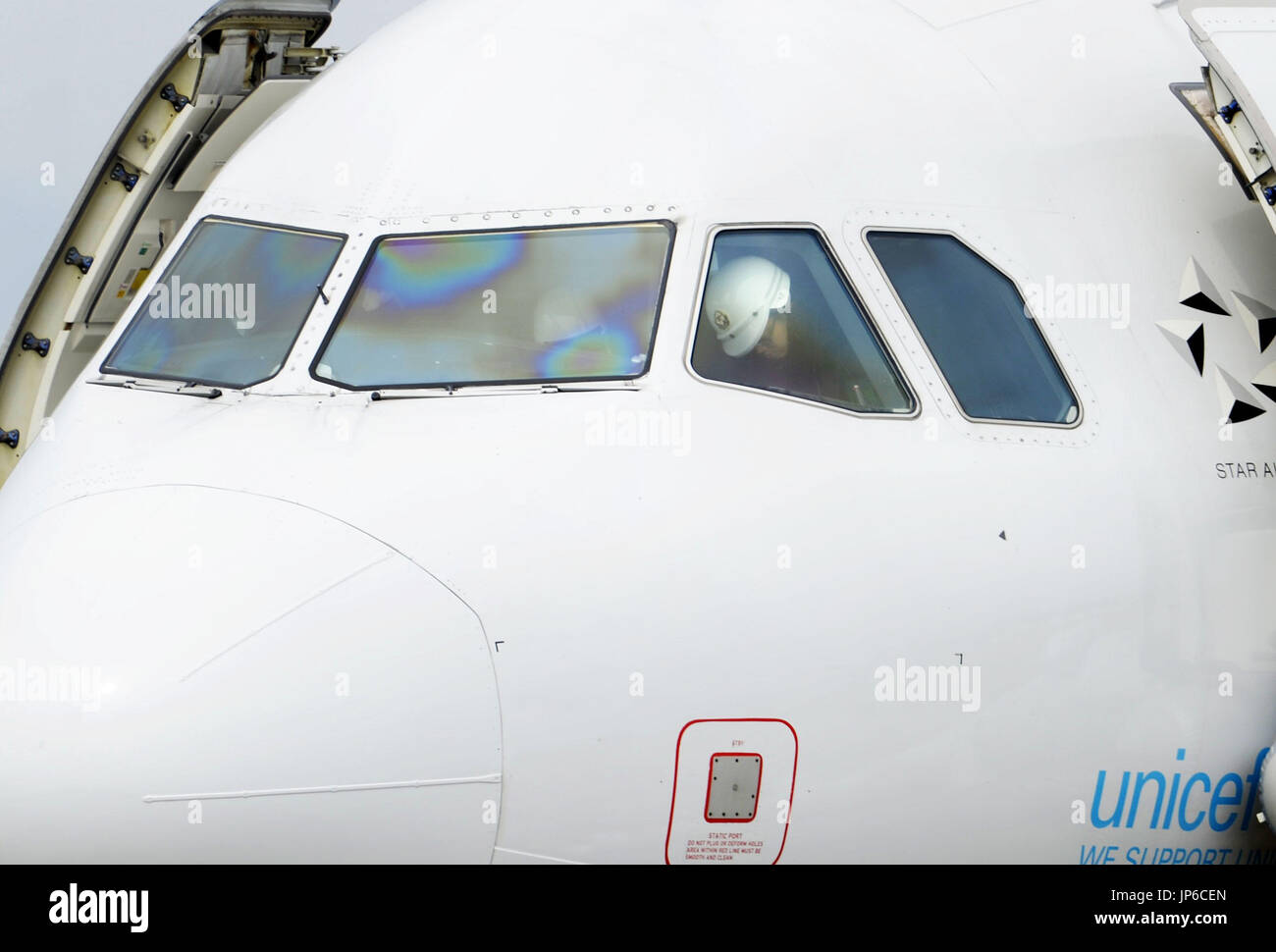 Investigators examine on April 16, 2015, the cockpit of an Asiana ...