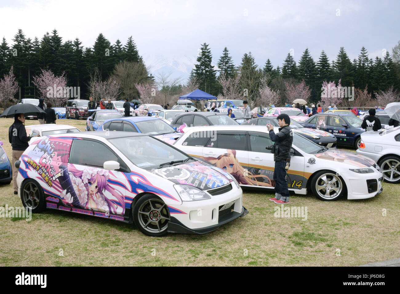 Cars known as "itasha," or those whose bodies are painted to depict ...