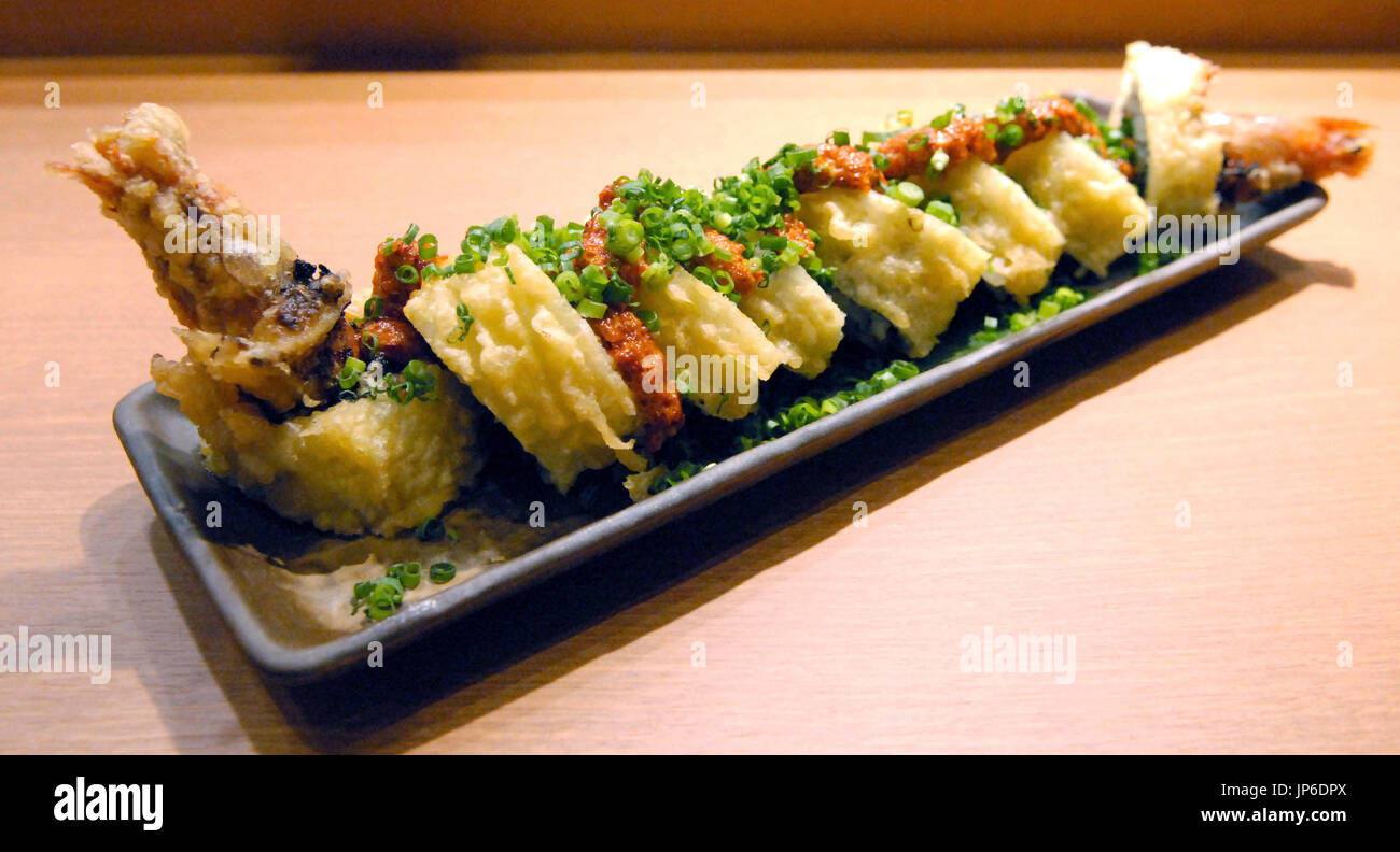 A sushi restaurant in the Shinjuku Toho Building in Tokyo's Kabukicho ...