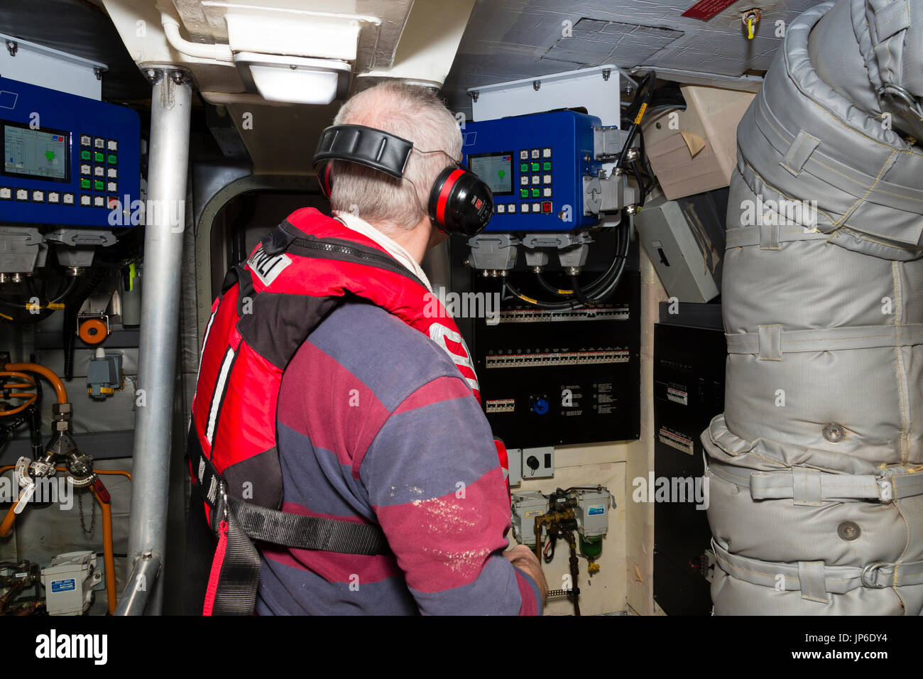 RNLI Lifeboat engine room and engineer Stock Photo - Alamy