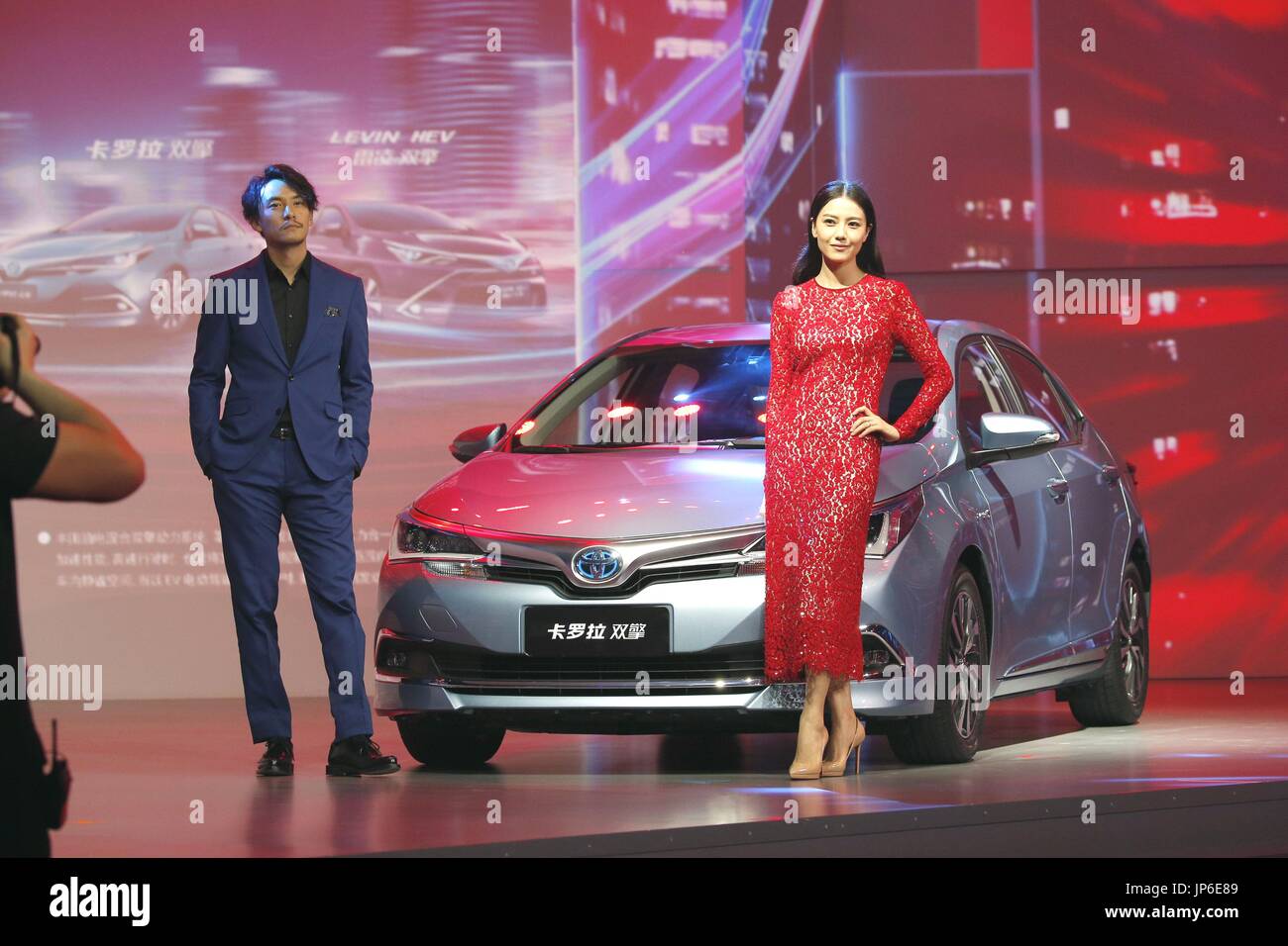 Toyota Motor Corp. takes the wraps off a new hybrid car developed in China for the Chinese ...