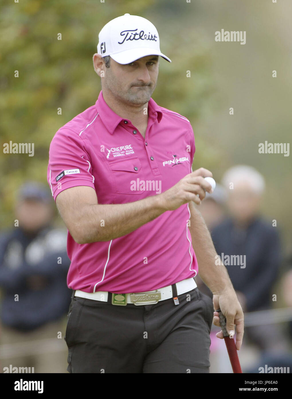 Michael Hendry of New Zealand acknowledges the crowd after sinking a ...