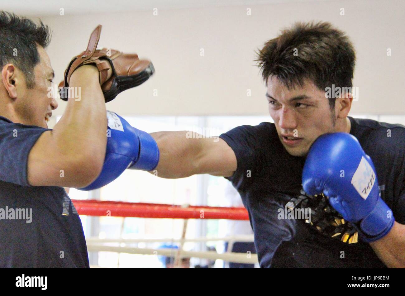 Japanese boxer Ryota Murata (R) trains during an open workout at Teiken ...