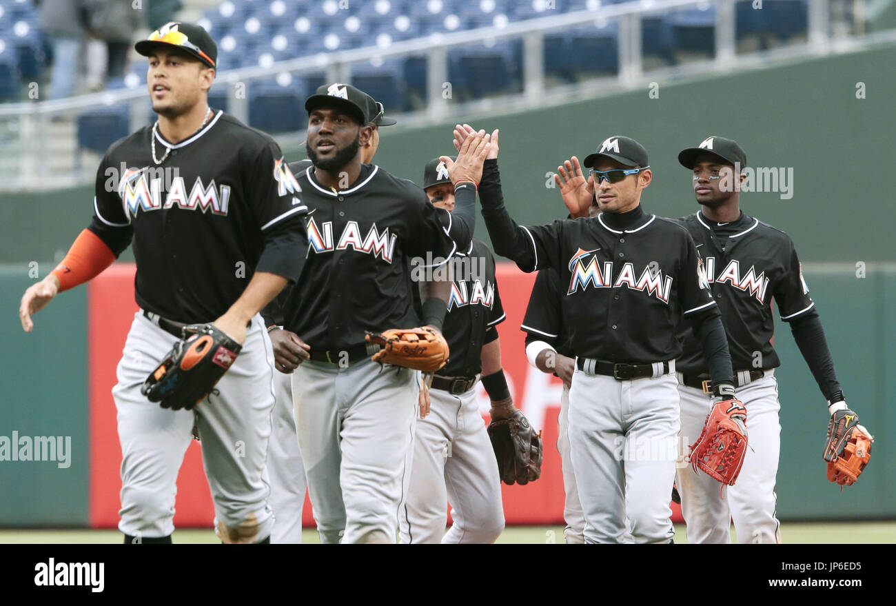 The Miami Marlins celebrate their 9-1 win over the Philadelphia ...
