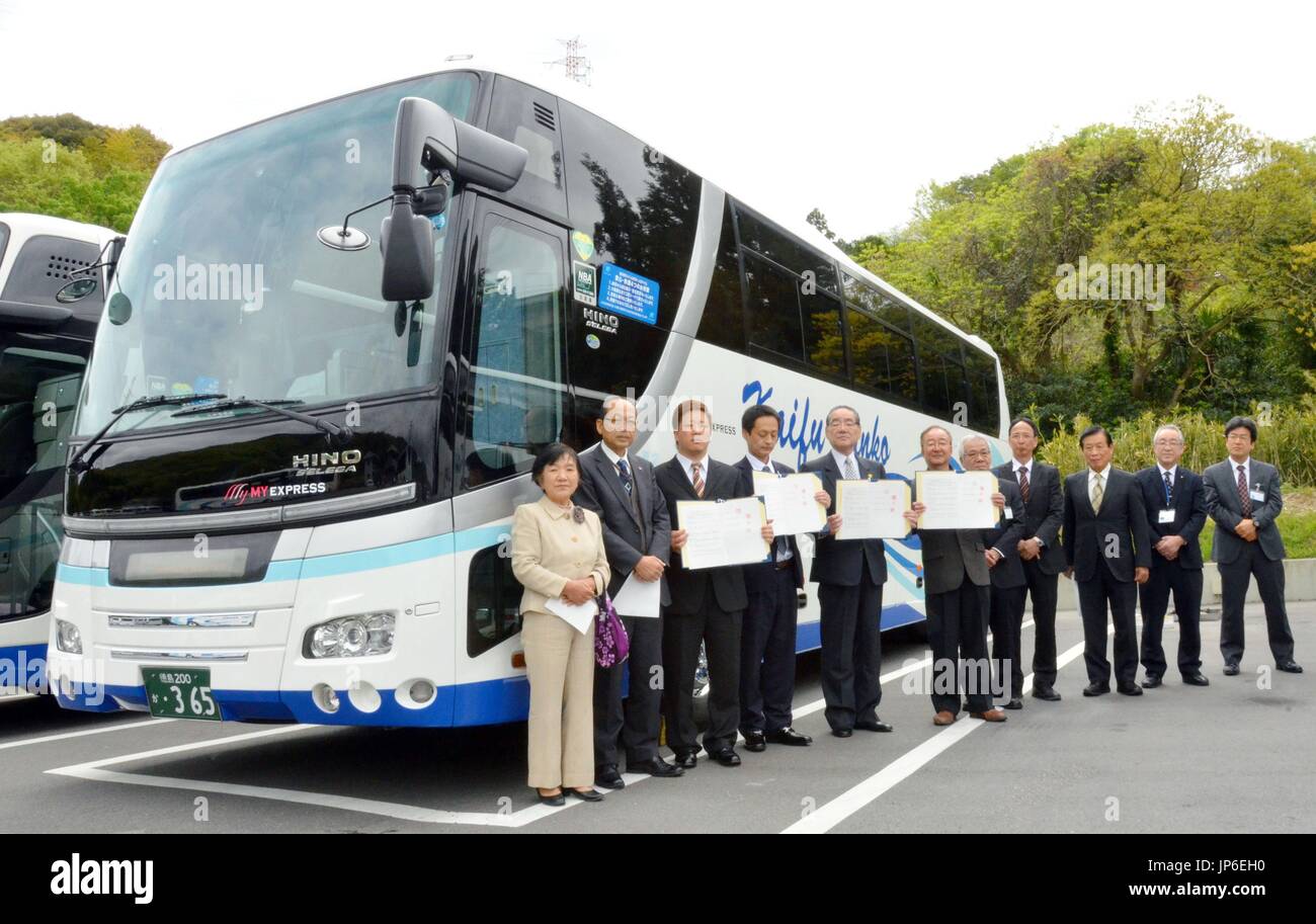 Personnel of Tokushima Prefecture's Anan city and Kaifu-Kankou Co. pose ...