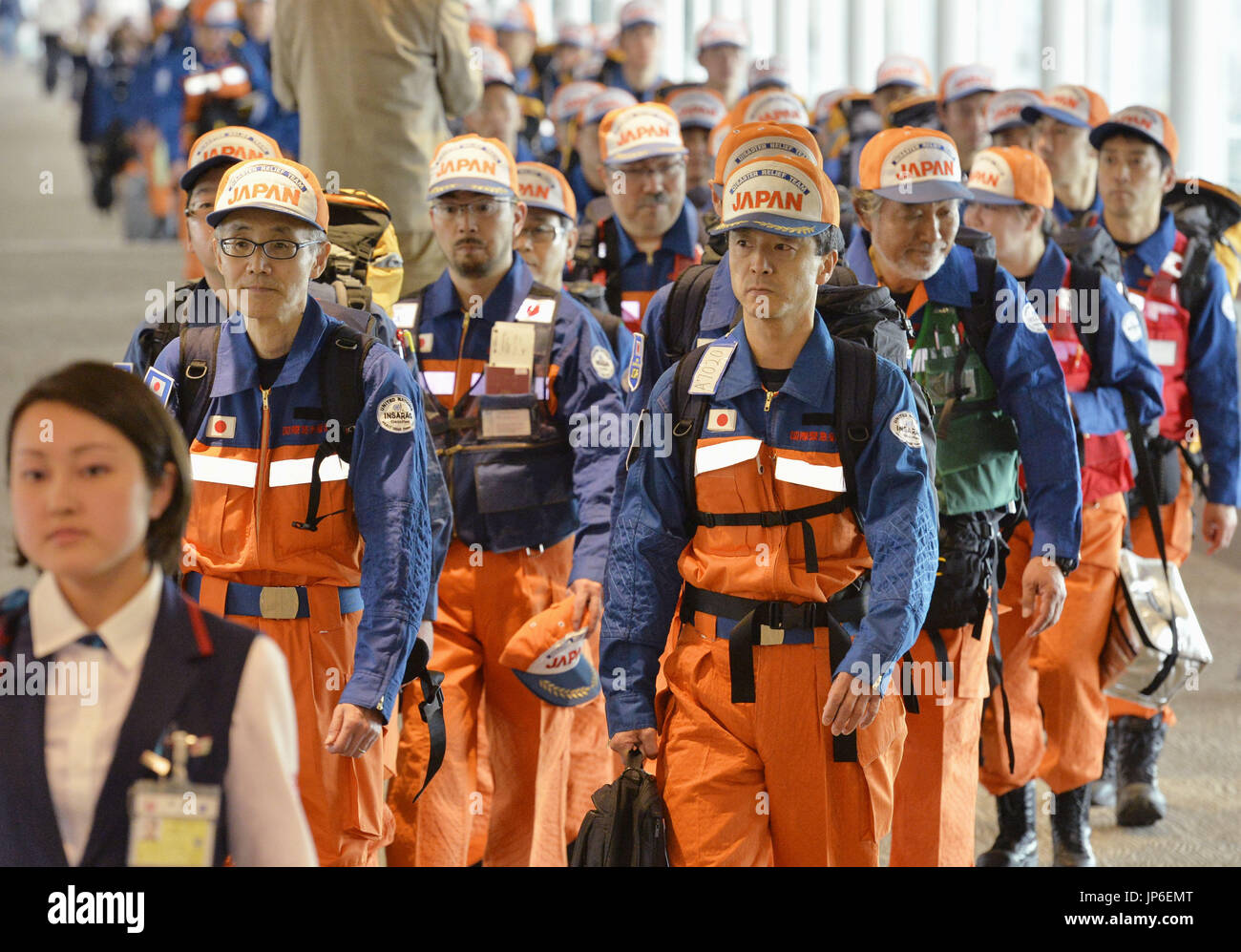 A Japanese disaster relief team is pictured at Narita airport near ...