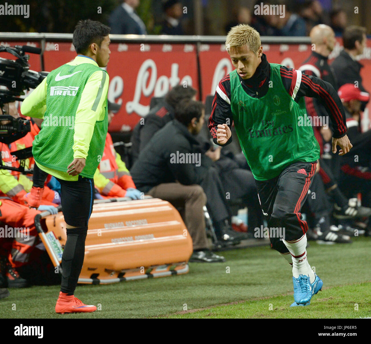 Japanese footballers Keisuke Honda (R) of AC Milan and Yuto Nagatomo of ...