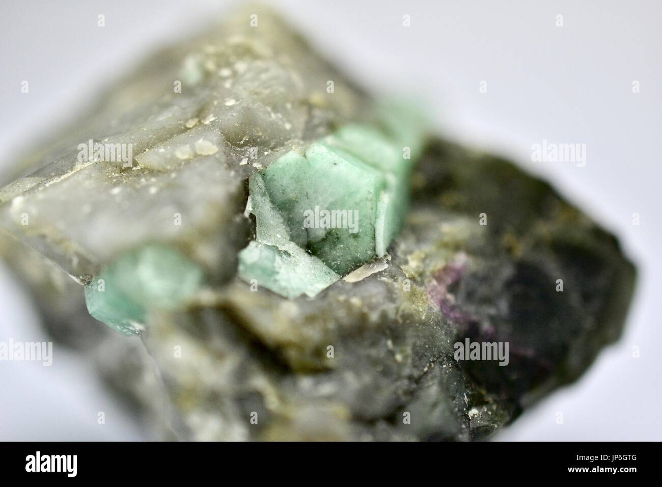 Rough Brazilian Emerald gemstone Stock Photo - Alamy