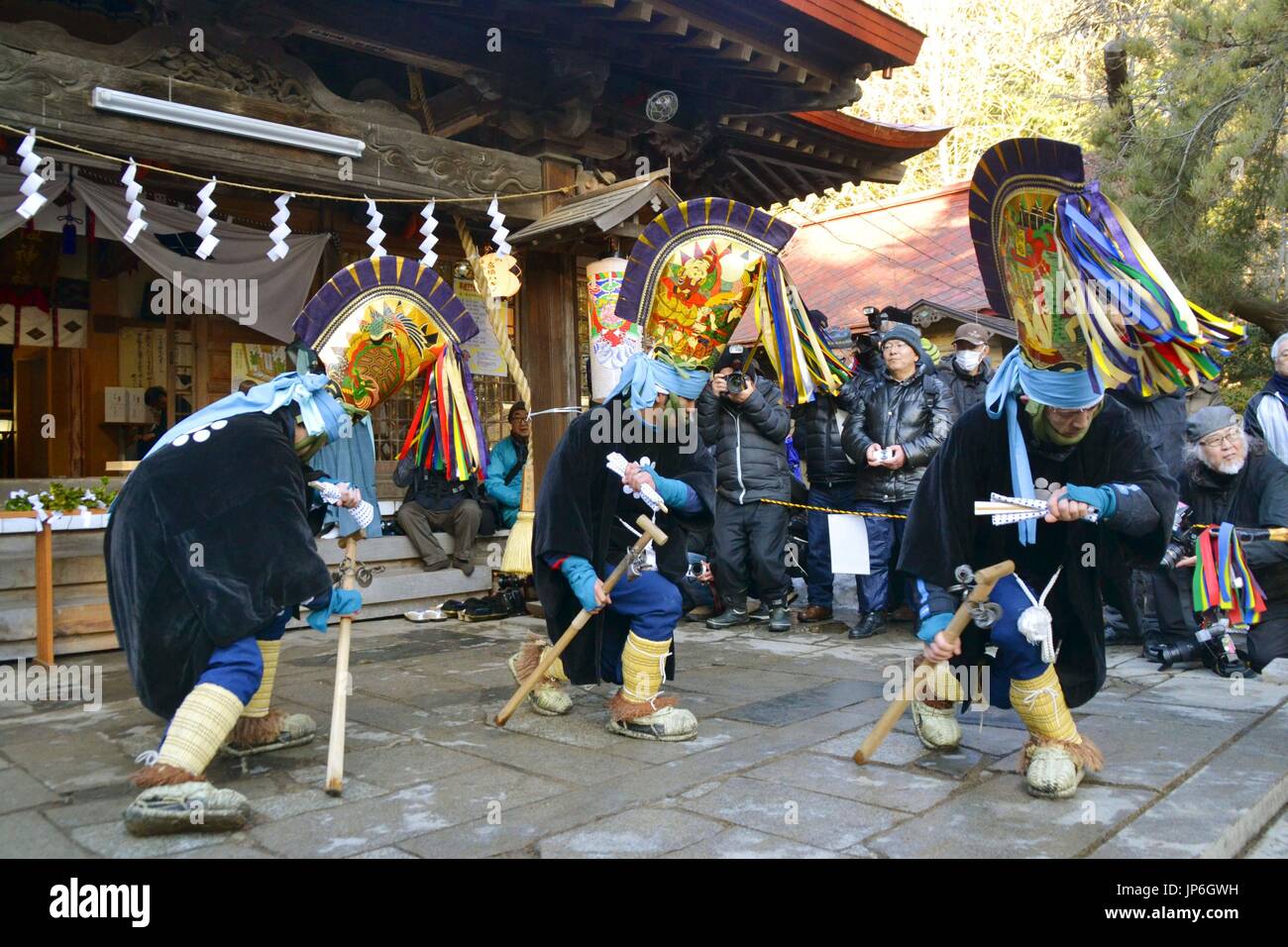 Dancers donning elaborate "eboshi" hats in the shape of horse heads ...