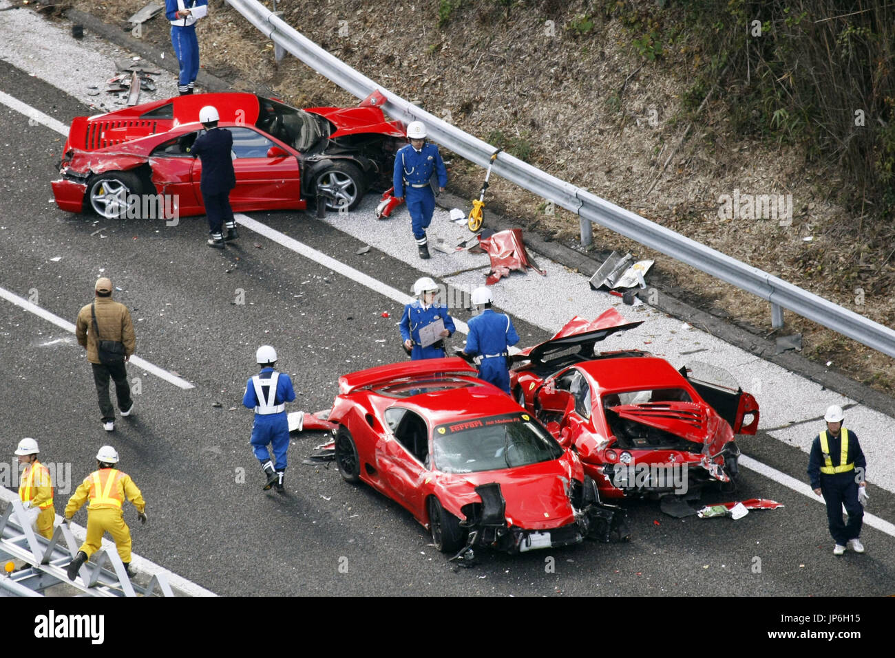 Photo take from a Kyodo News helicopter shows three Ferrari cars ...