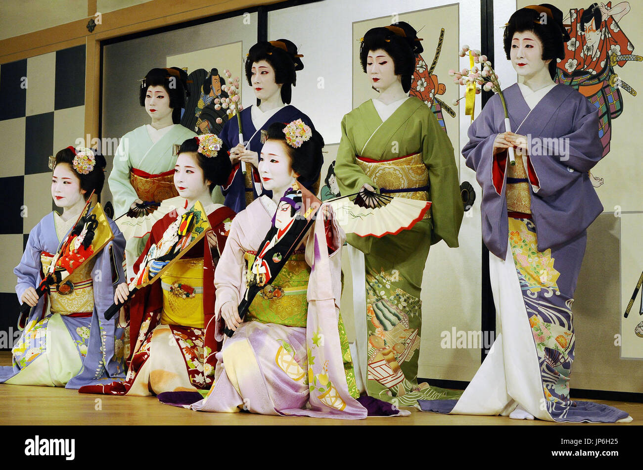 Geiko, traditional Japanese female entertainers, and maiko, or ...