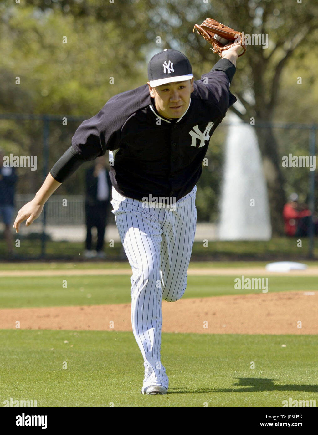 New York Yankees pitcher Masahiro Tanaka of Japan fields during the ...