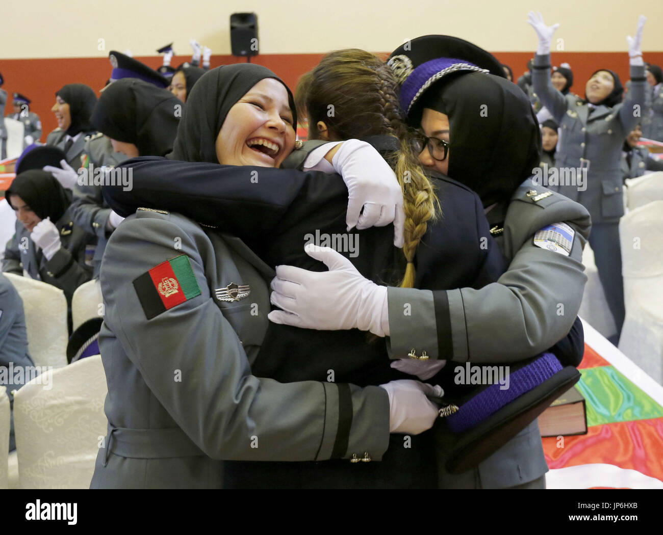 Afghan female police officer candidates hug each other in joy after a ...