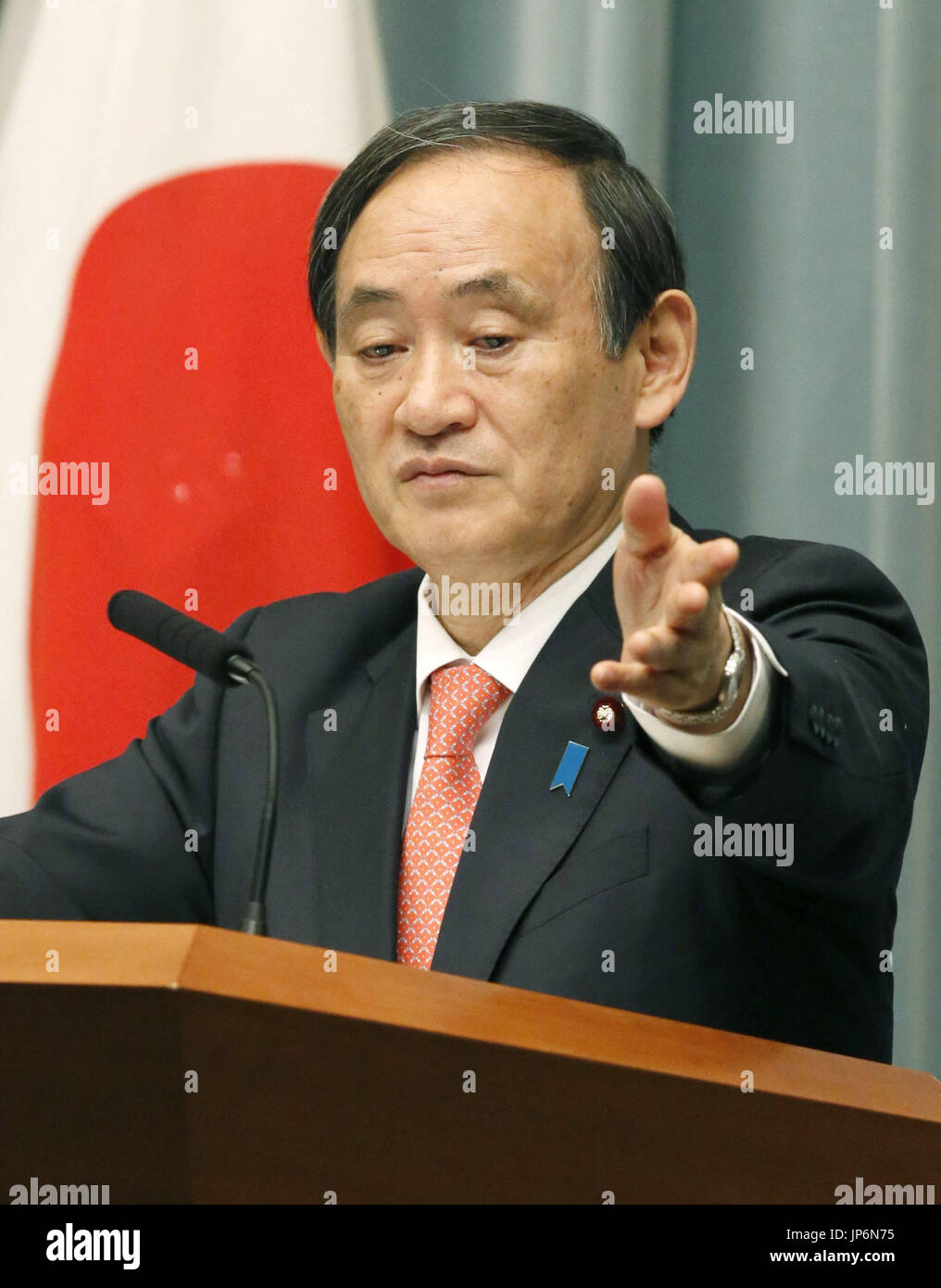 Chief Cabinet Secretary Yoshihide Suga announces on April 2, 2015, at a ...