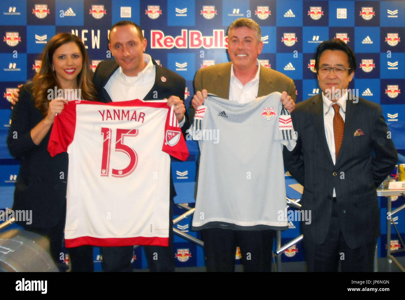 Ken Araki (R), corporate communication general manager of Yanmar Co ...