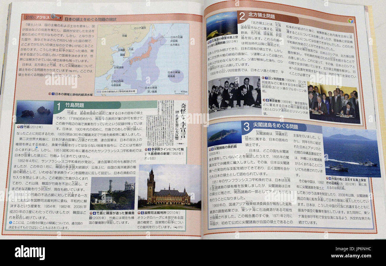 Undated photo shows a Japanese social studies textbook authorized for ...