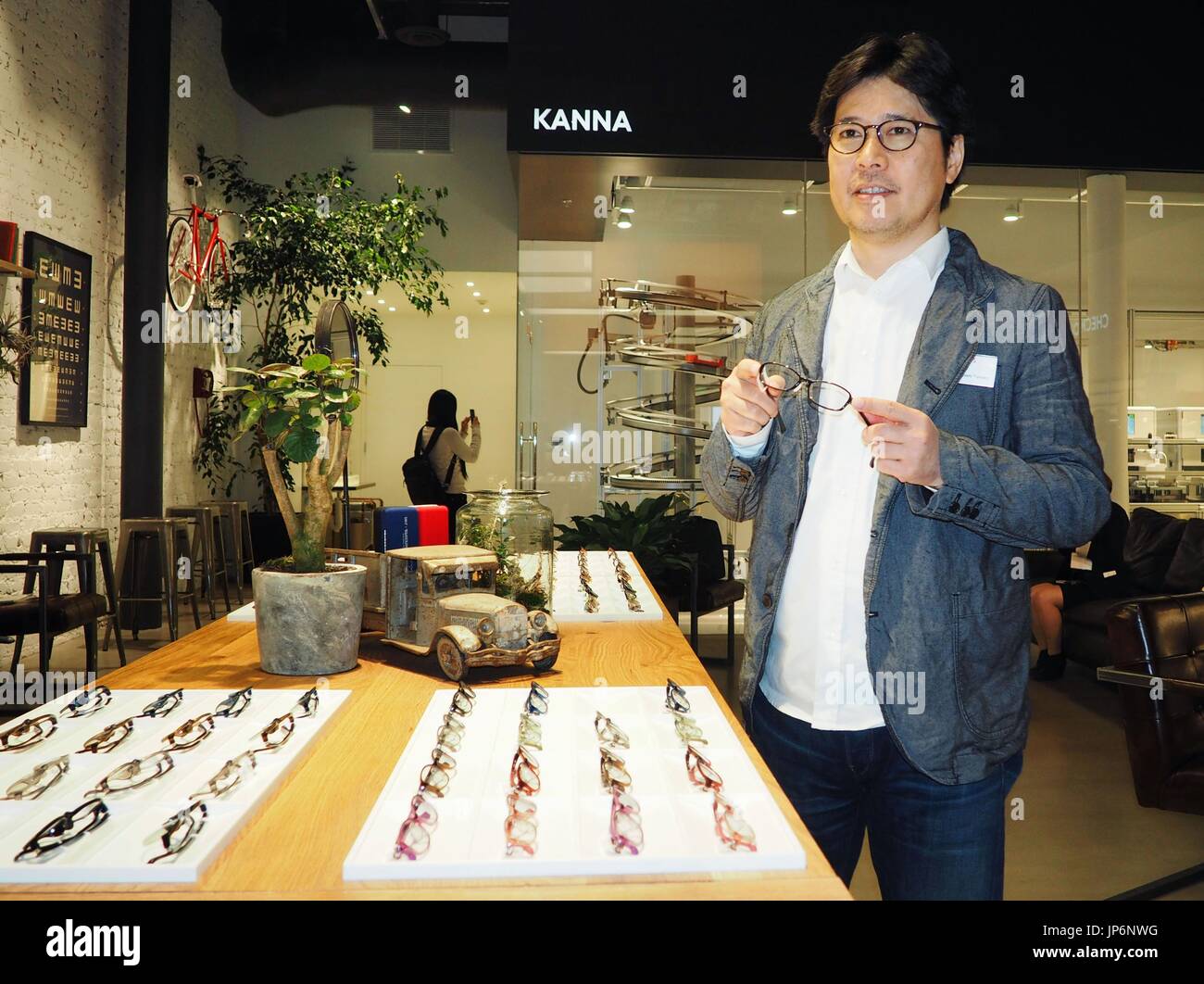 Hitoshi Tanaka, president of Japanese low-cost eyeglasses shop operator ...