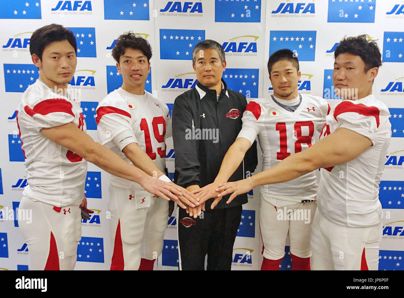 Members of Japan's national American football team pose during a press ...