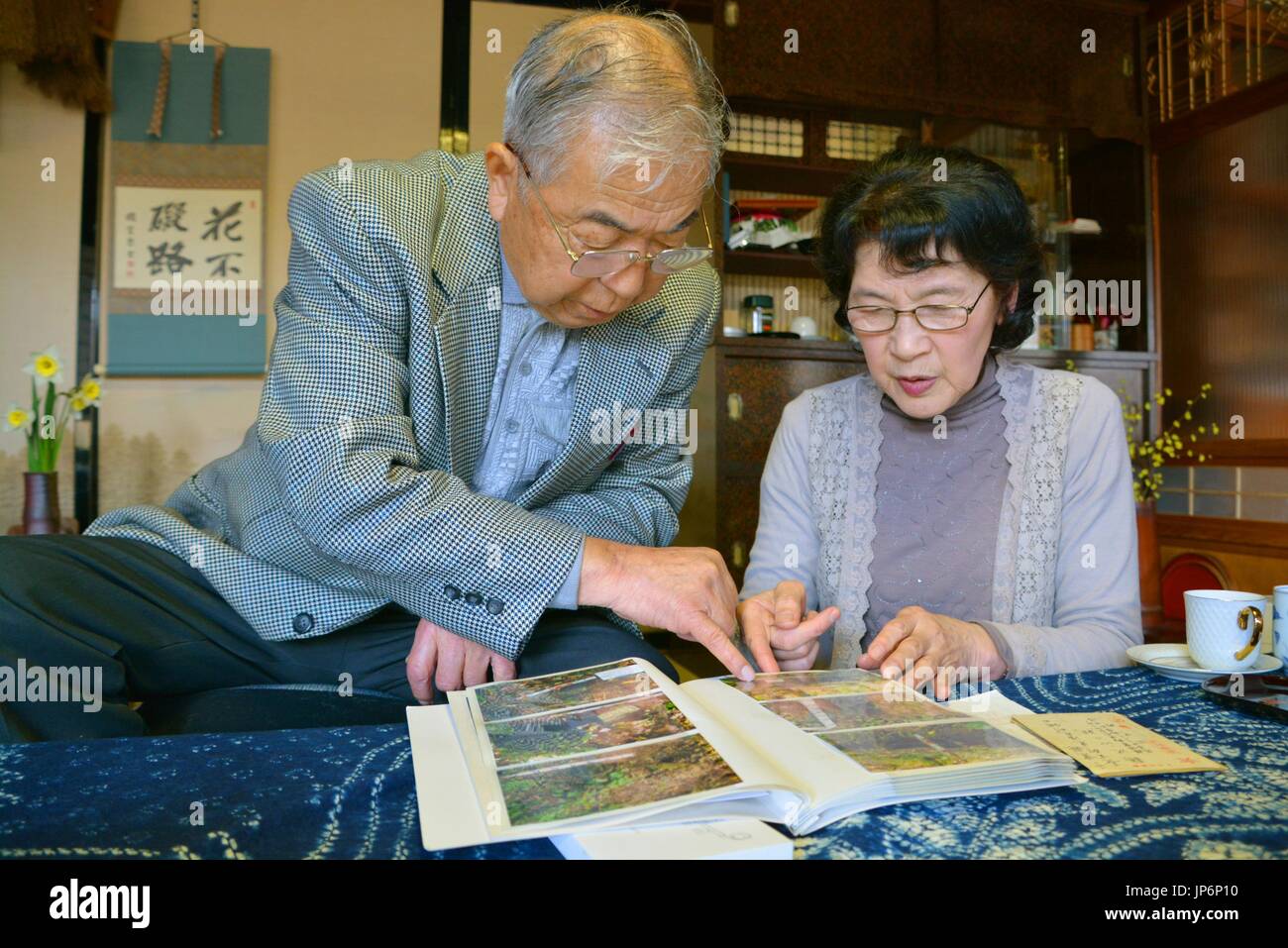 Kyoko Tanaka (R) and her husband Yasukuni look in Rokunohe, Aomori ...