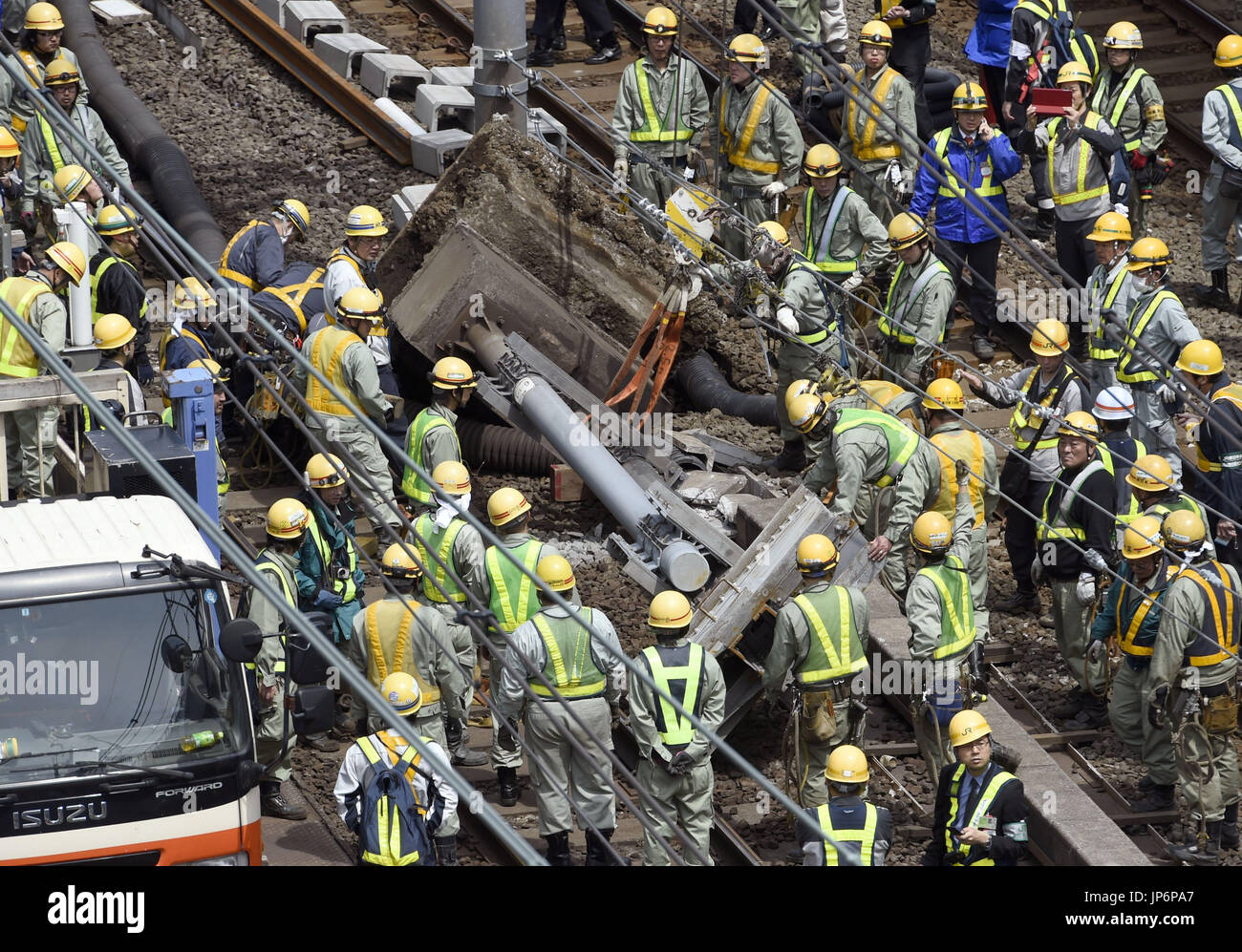 Photo taken on April 12, 2015, shows collapsed cable-supporting posts ...